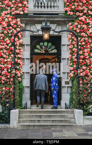 A doorman stands at the entrance to Annabels private Club in Berkeley ...