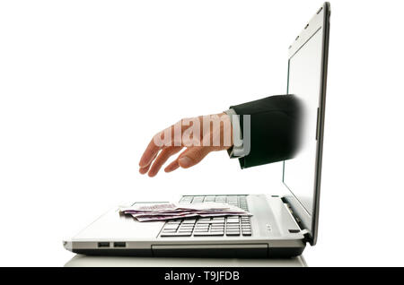 Hand reaching out of laptop screen to steal money Stock Photo - Alamy