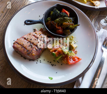 Braised tuna fillet with vegetables Stock Photo - Alamy