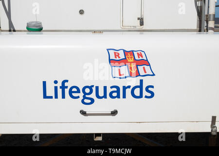 RNLI lifeguards sign Stock Photo - Alamy