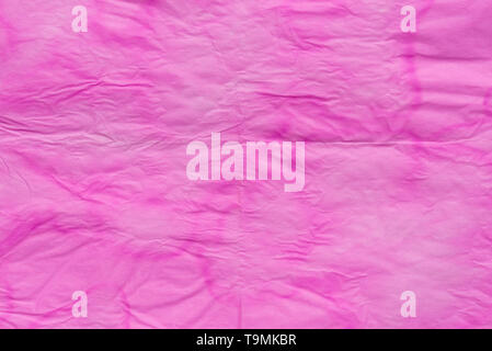 pink color creased paper tissue background texture Stock Photo - Alamy