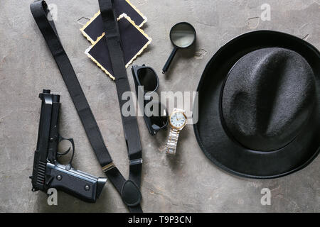 Composition with different items for detective on wooden table Stock ...