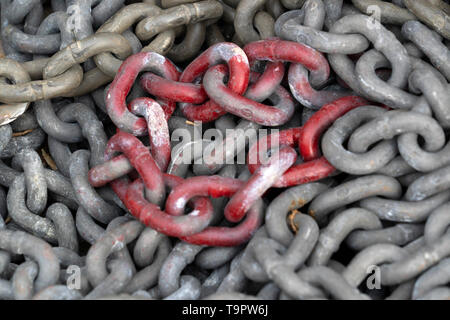 Red blood stained iron chains detail Stock Photo - Alamy