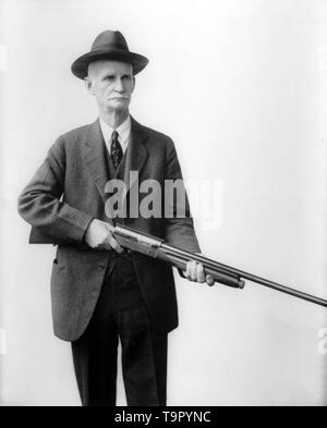 American gunmaker John Moses Browning with with his Auto 5 shotgun ...
