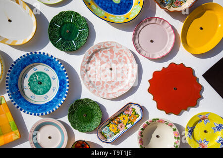 Collection of colorful Portuguese ceramic pottery, local craft products ...