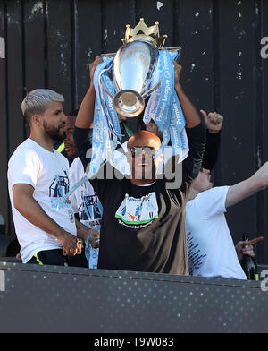 Manchester City's Vincent Kompany lifts the trophy during the Barclays ...