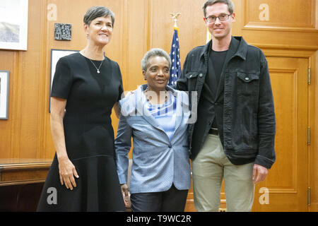 Mayor Lori Lightfoot and her wife, Amy Eshleman, walk in the 50th ...