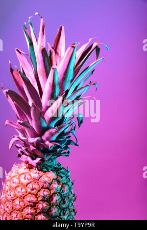 Ripe pineapple on a pink toned background. Copy space Stock Photo - Alamy