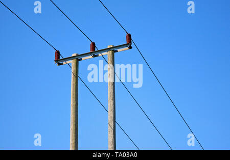 Norfolk, England, UK. Power lines and pylons across a field Stock Photo ...