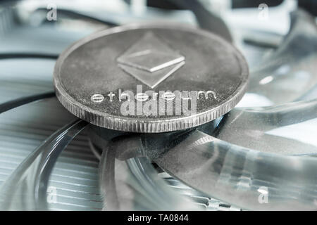 ETH, Ethereum coin on bitcoins background, cryptocurrency investing ...