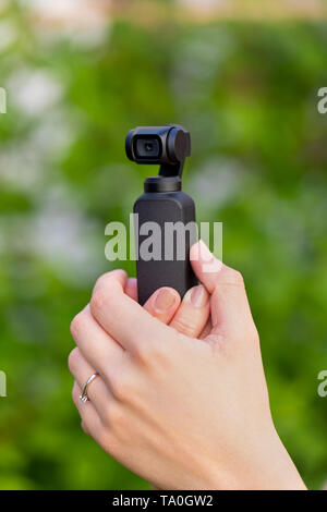 Close up picture of osmo camera in female hands Stock Photo - Alamy