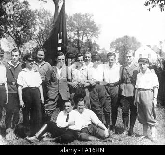 Members of an SA-Sturm have line up during a mass event of the NSDAP ...