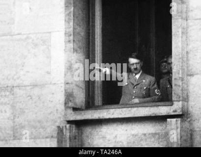 Adolf Hitler at the window of the Reich Chancellery, 1934 Stock Photo ...