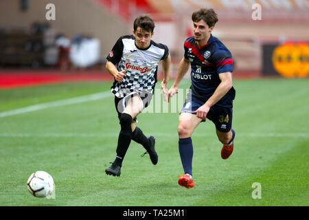 Charles Leclerc (left) in action during the drivers football match at ...