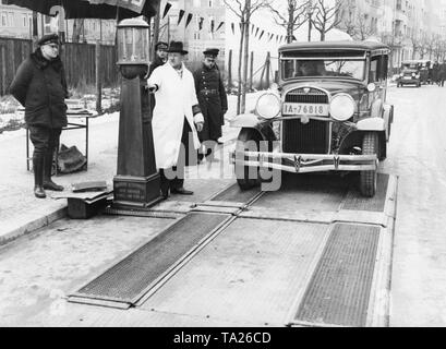 Car on the brake test bench (brake test Stock Photo - Alamy