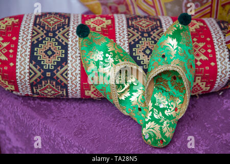 Traditional Arabic (aladdin) slippers on white background. Felt shoes ...
