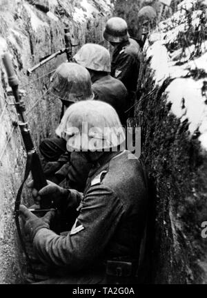 German Wehrmacht soldier with a Mauser rifle in his hands Stock Photo ...