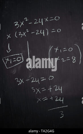 Maths problems written on a classroom blackboard at Chu Van An School ...