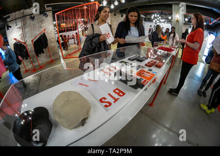 Fans of the Koran K-Pop band BTS shop for band â€œmerchâ€ at a pop-up ...
