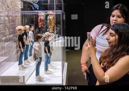 Fans of the Koran K-Pop band BTS shop for band â€œmerchâ€ at a pop-up ...