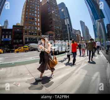 Crowd of distracted people walking in the city street and using ...