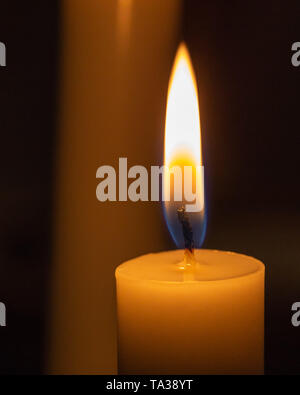 a lit candle Stock Photo - Alamy