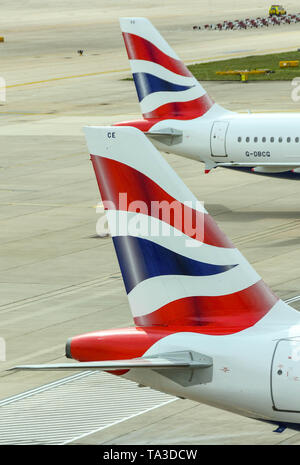British Airways aircraft tail fins London Heathrow airport Stock Photo ...