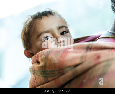 Little asian muslim boy with black cap praying isolated over white ...