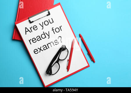 Clipboard with text ARE YOU READY FOR EXAMS? on color background Stock ...