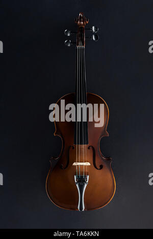 classical violoncello in darkness on textured surface Stock Photo - Alamy