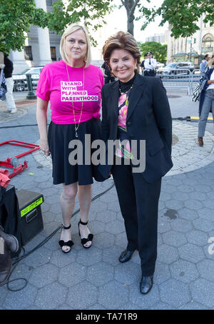 People attend an abortion-rights rally at the Utah State Capitol ...