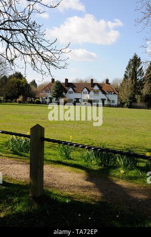 White cottages beside the green, Aldenham, Hertfordshire, were built by ...