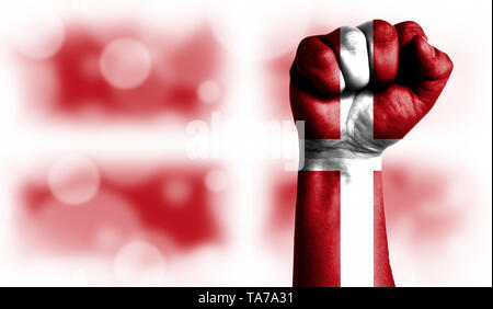 Flag of malta painted on male fist, strength,power,concept of conflict ...