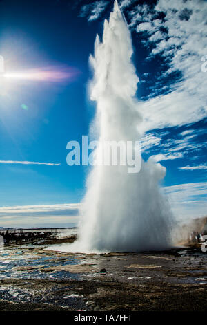 The blue water bubble of Strokkur geyser is about to burst, the start ...