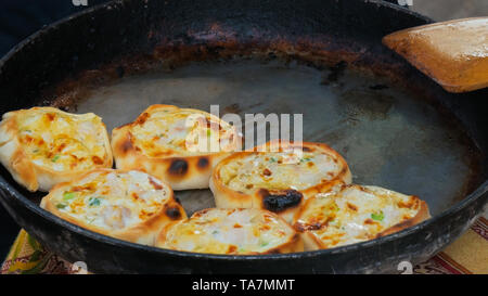 Process of cooking hot pies with chicken and cheese Stock Photo - Alamy
