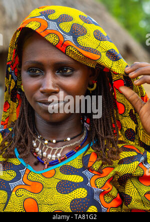 Portrait of a Peul tribe young woman with colorful clothes, Savanes ...