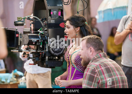 ALADDIN, from left: Naomi Scott as Jasmine (center), Numan Acar as ...