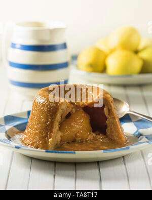 Sussex pond pudding, a steamed British dish filled with a lemon sugar ...