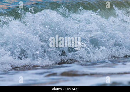 Seashore on stone beach. Close up view Stock Photo - Alamy