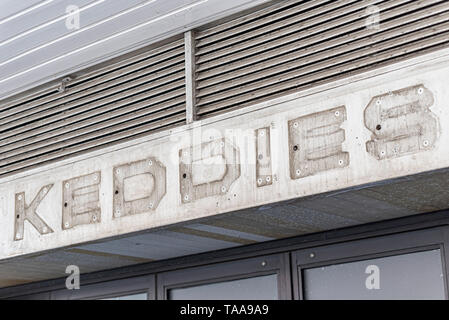 Old shop sign uncovered in Southend on Sea, Essex, UK. Van Looys ...