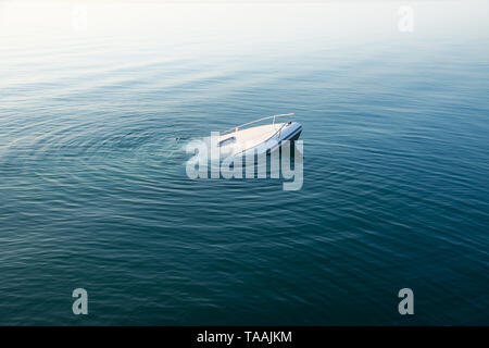 Sinking modern large white boat goes underwater Stock Photo - Alamy