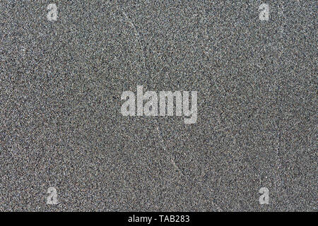 Volcanic black sand background taken in Bali Stock Photo - Alamy