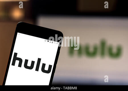 In this photo illustration, a Hulu logo is displayed on a smartphone ...