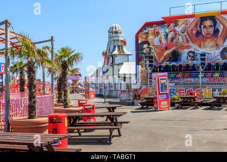 Beach promenade and amusement Pier at Clacton on Sea on the Essex coast ...