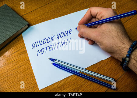 Handwriting text writing Unlock Your Potential question. Concept ...