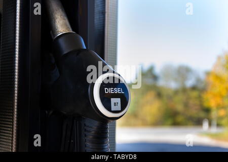 New fuel labeling at petrol station pumps with new EU labels, sunny ...