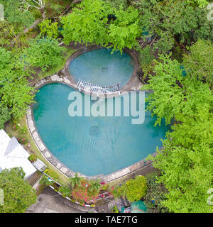 The Soda Water Pool in Camiguin in the Philippines which is surrounded ...