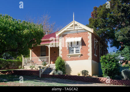 Australian 1920s cottage with bull nose front verandah Stock Photo - Alamy