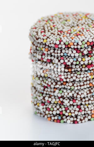 Round chocolate bar sprinkled with colorful sprinkles Stock Photo - Alamy