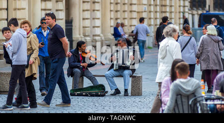 Romani (Gypsy) musicians/ "lautari" playing for a party in Romania ...